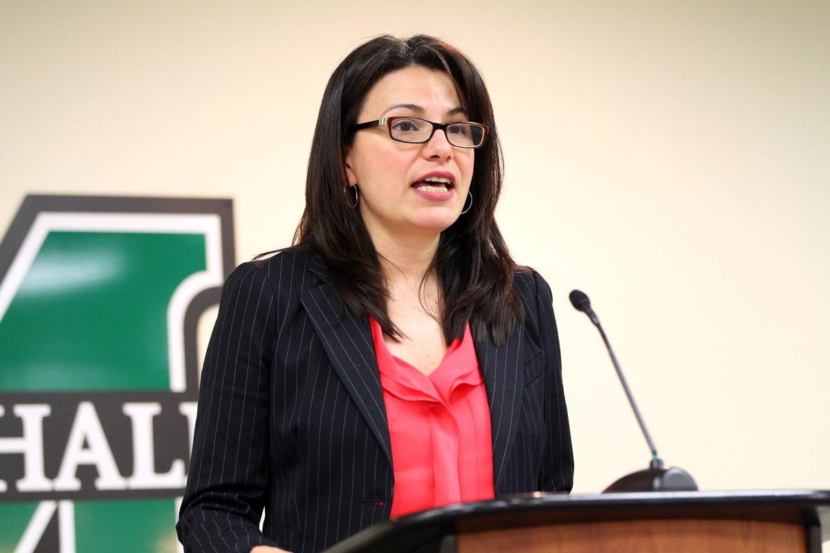 Former Hillary Clinton campaign manager urges women to take on ...