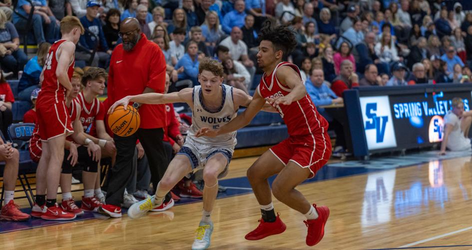 Prep boys basketball region co-final: Timberwolves rough up Big Reds ...