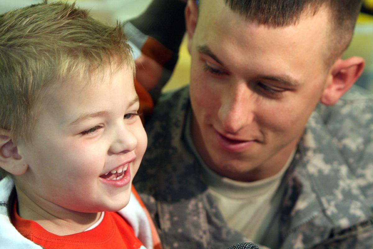 Gallery: Soldier reunited with son | Photos News | herald-dispatch.com