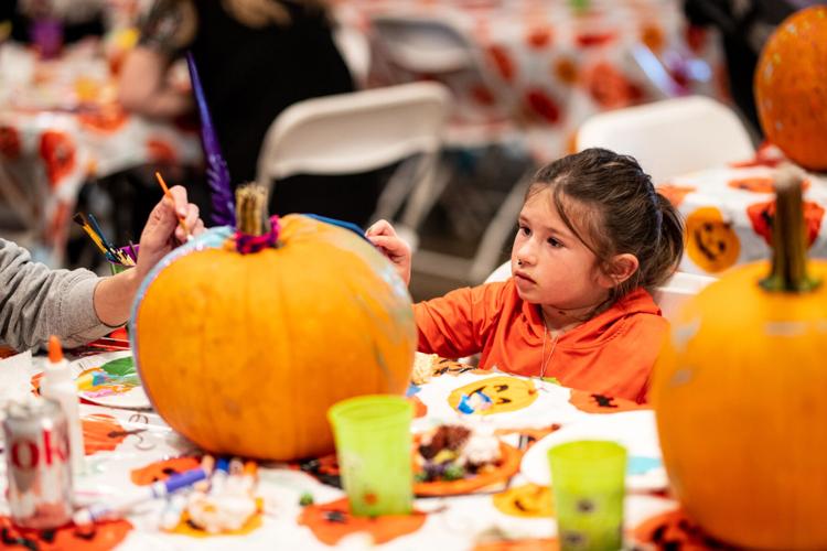 Kids decorate pumpkins during park district Pumpkin Party | News ...