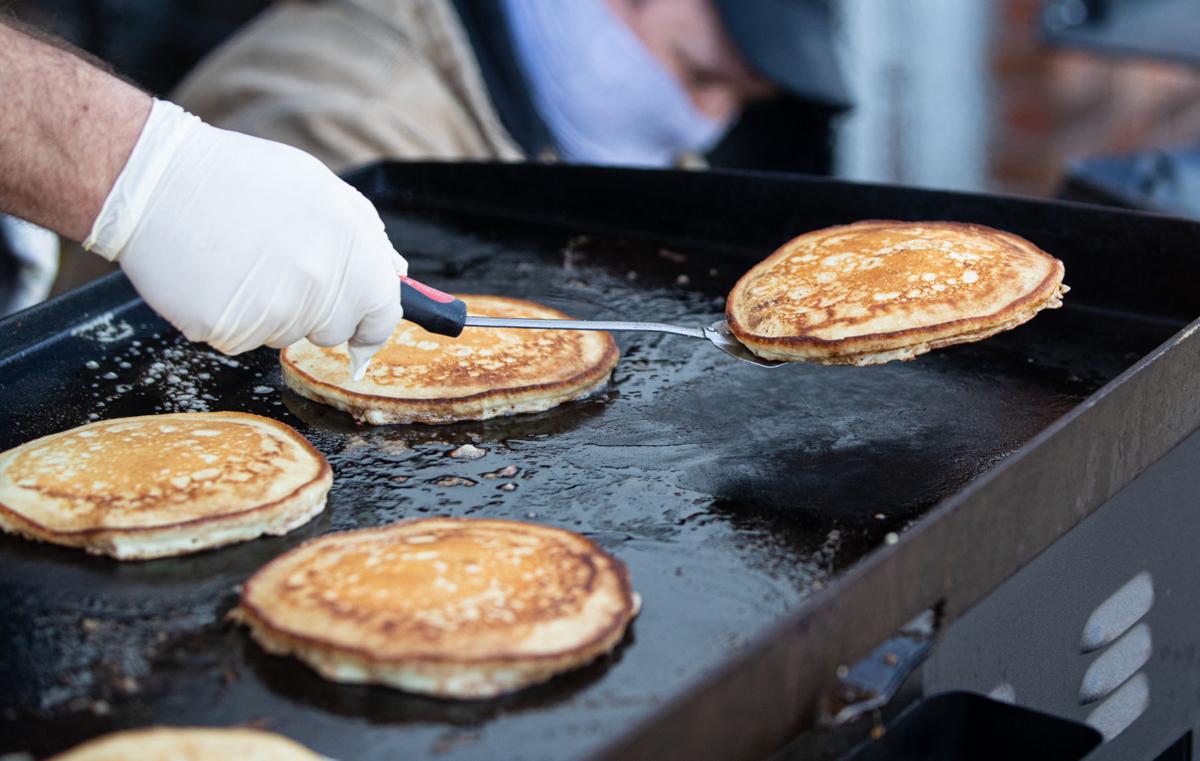 Community flips for fire department’s pancake breakfast | News | herald ...