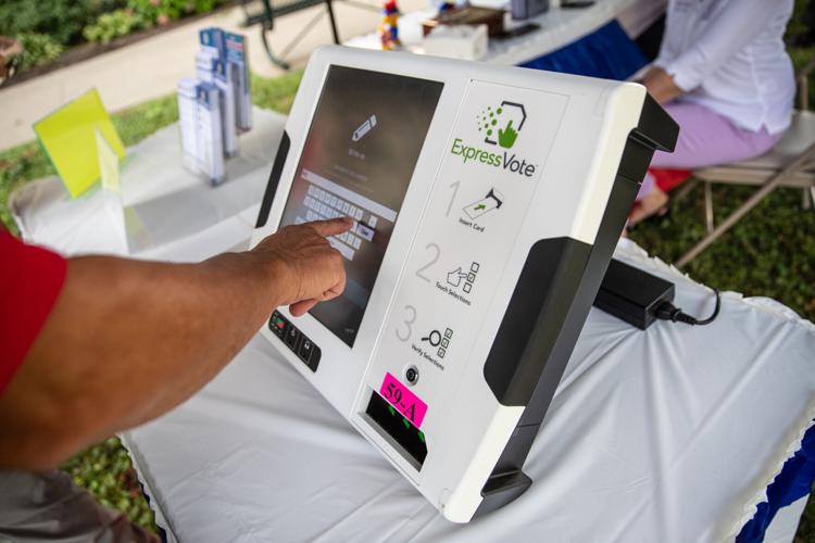 Residents register to vote on National Voter Registration Day | News ...