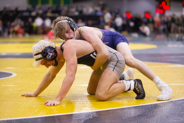 Prep wrestling: Highlanders' Barrett, Hood show strong in first round ...