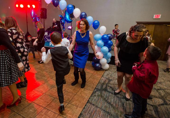 Photos: 3rd annual Mom & Son Prom | Multimedia | herald-dispatch.com
