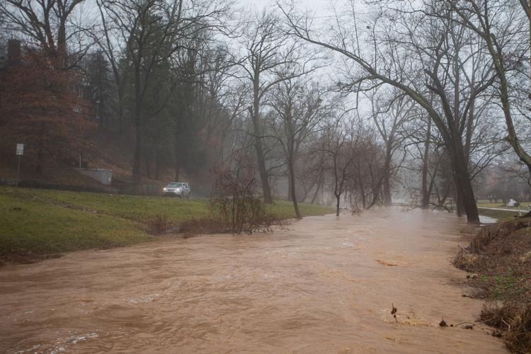 Photos: Flood waters rise around Huntington | Multimedia | herald ...