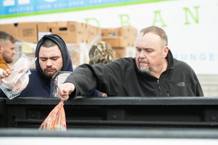 Huntington-area food bank serves hundreds at mobile pantry | News ...
