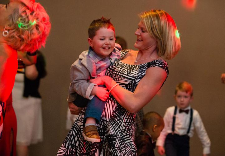 Photos: 3rd annual Mom & Son Prom | Multimedia | herald-dispatch.com