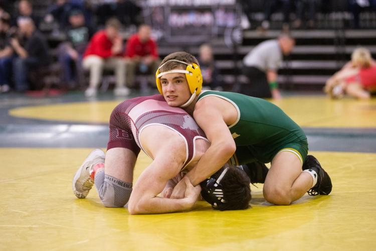 Prep wrestling: Highlanders' Barrett, Hood show strong in first round ...