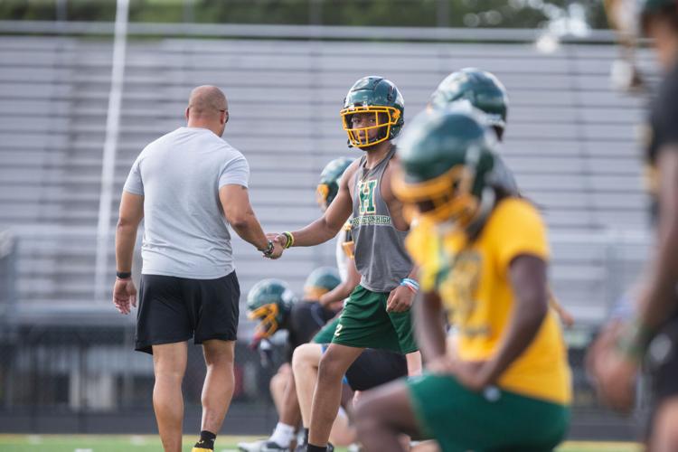 Photos: HHS football team conducts first day of summer practice ...