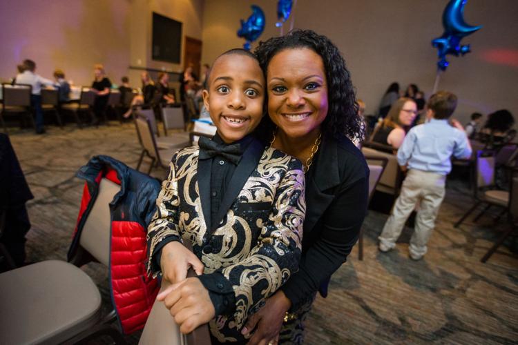 Photos: 3rd annual Mom & Son Prom | Multimedia | herald-dispatch.com