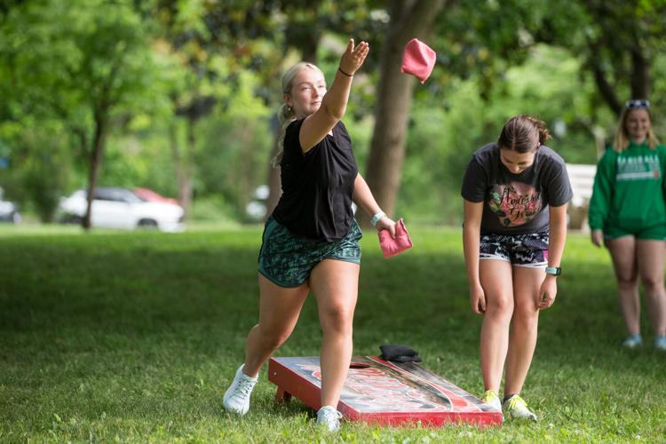 Locals enjoy weather with cornhole match | News | herald-dispatch.com