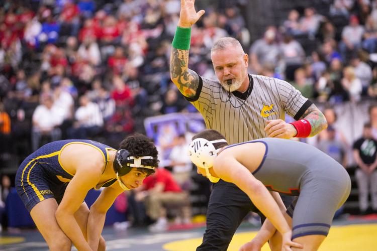 Prep wrestling: Highlanders' Barrett, Hood show strong in first round ...