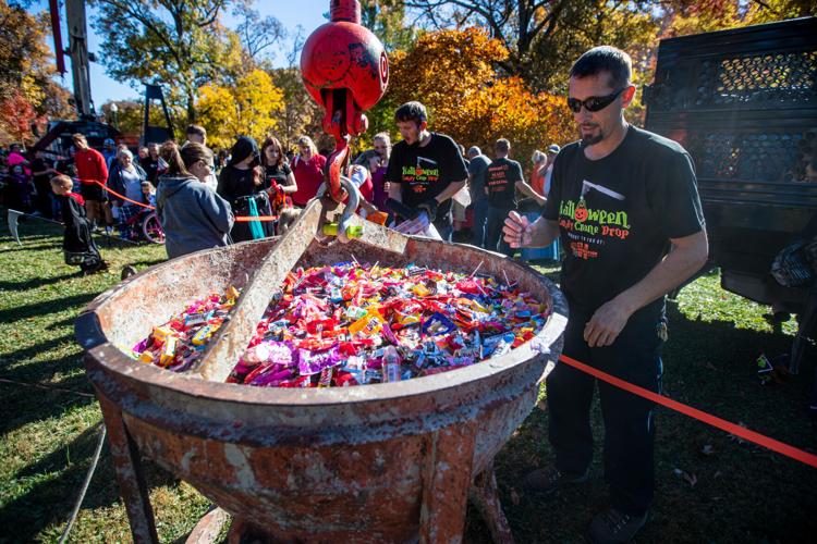Photos: Halloween Candy Crane Drop | Multimedia | herald-dispatch.com