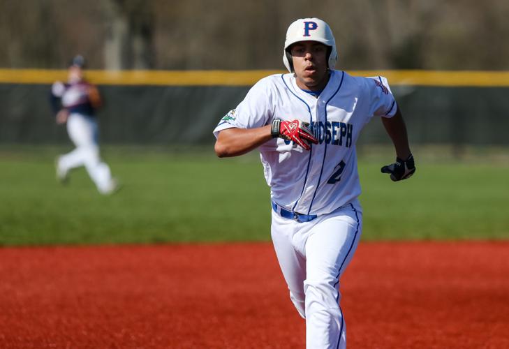 Photos: St. Joe baseball defeats Man, 8-1 | Multimedia | herald ...