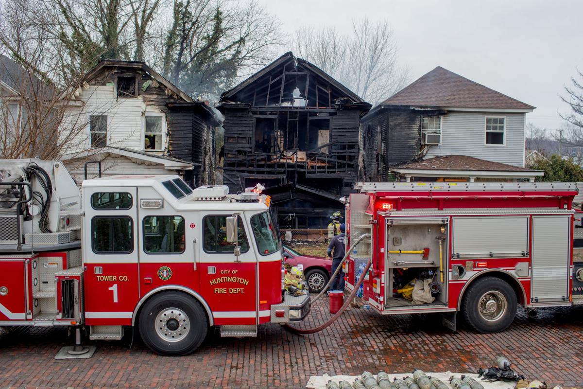 Firefighters battle 3-house fire in Huntington's west end | News ...
