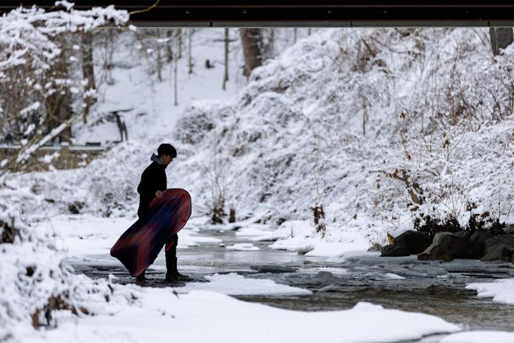 Sleds, shovels and snowmen: Huntington residents brave the cold for ...