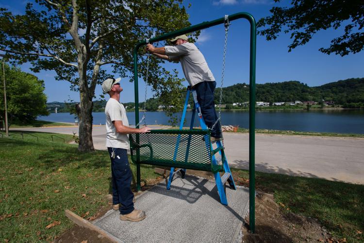 Seats with a view: New swings installed at Harris Riverfront Park ...