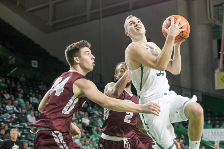 Photos: MU Basketball team defeats Concord University | Multimedia ...