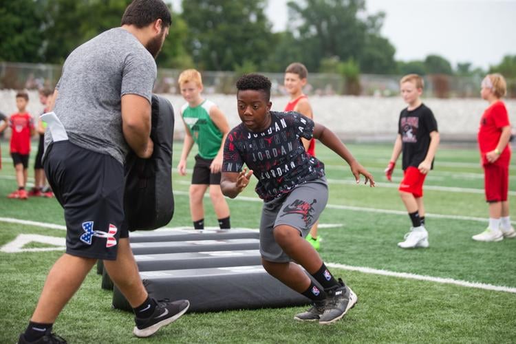 Photos: Austin Pleasants conducts football camp at Dawson-Bryant High ...