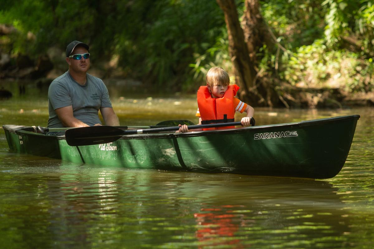 People paddle area lakes, rivers in celebration of National Canoe Day ...