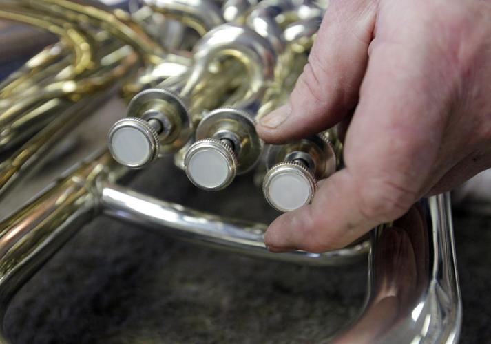 Decades of musical repair a labor of love for Terry Roush | News ...