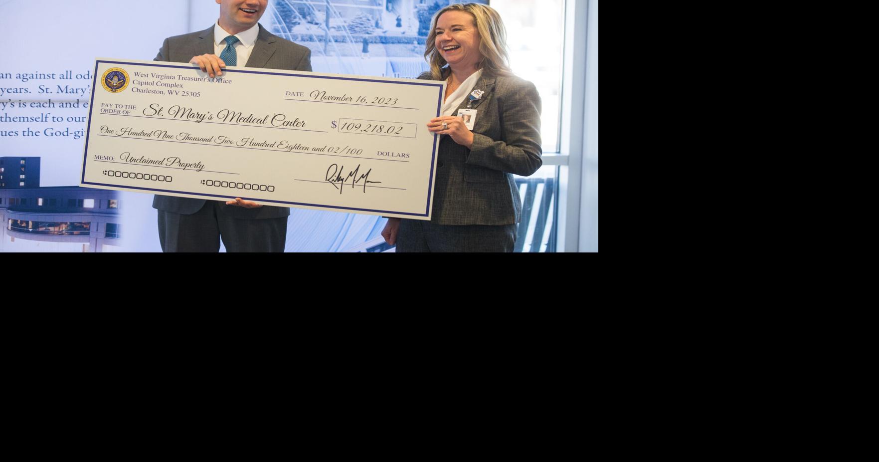 State Treasurer Riley Moore presents unclaimed property checks to local ...