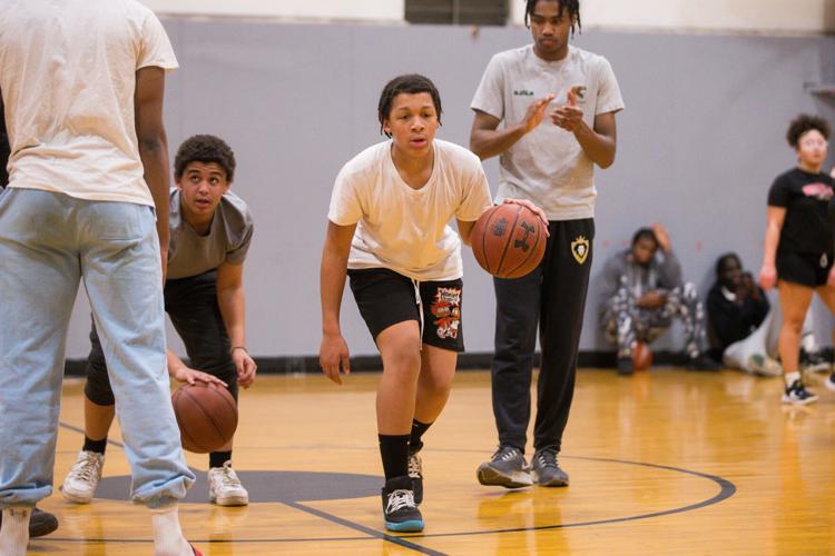 Community outreach event invites youth to free basketball training ...
