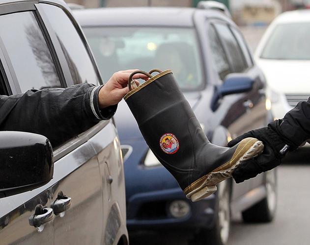 Boot drive benefits city mission | News | herald-dispatch.com
