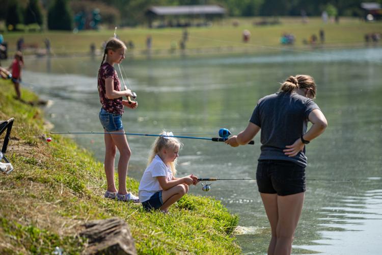 Anglers bring children to Barboursville for annual kids fishing day ...