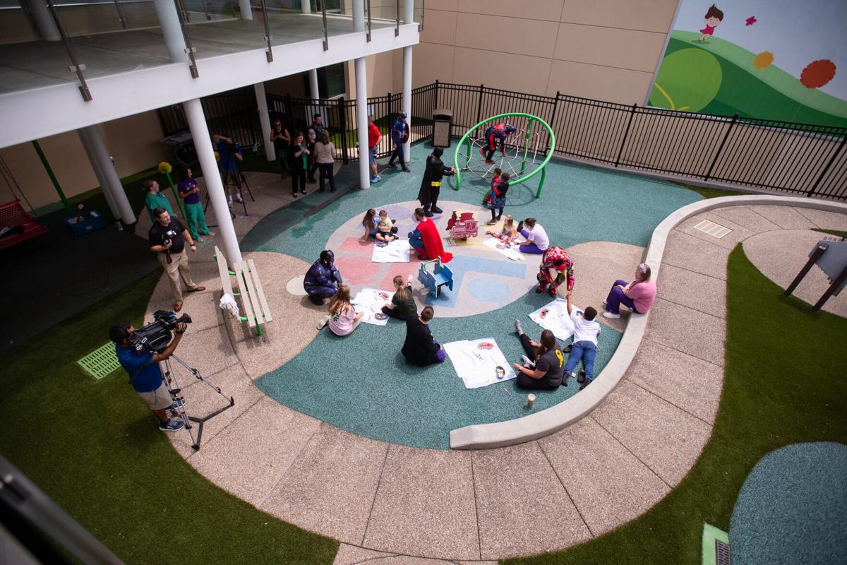 Photos: Central Window Cleaning workers visit Hoops Family Children's ...