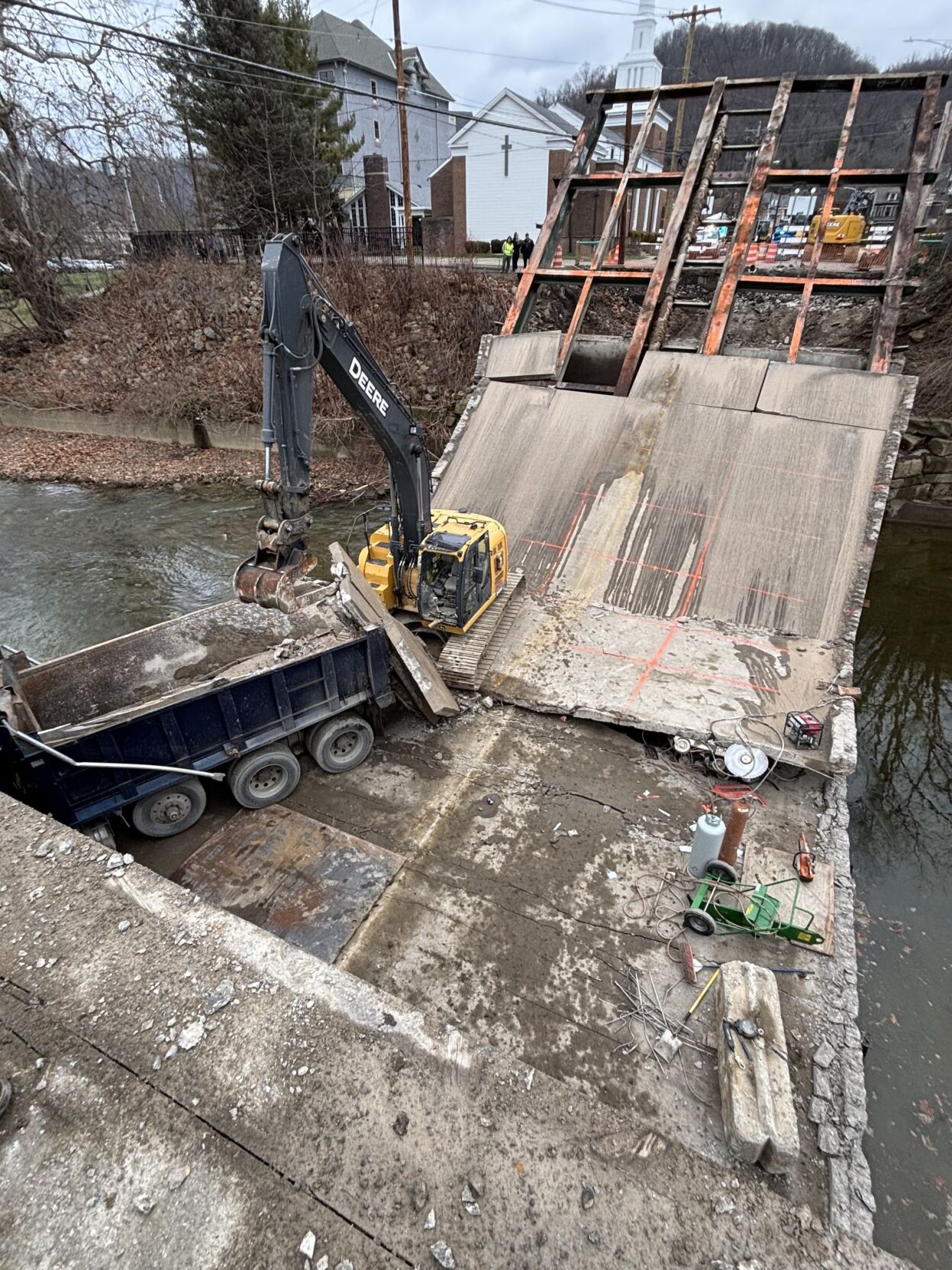 Portion of Wheeling bridge collapses ahead of scheduled demolition ...