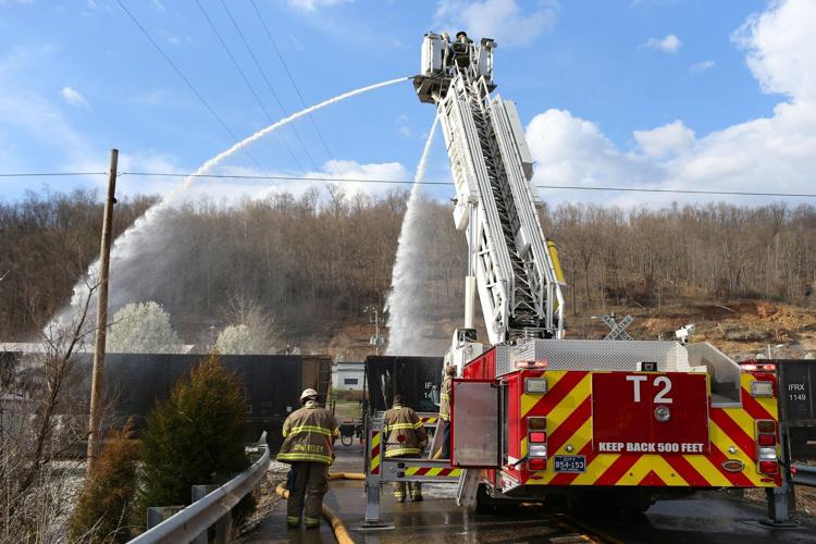 Train cargo catches fire | News | herald-dispatch.com
