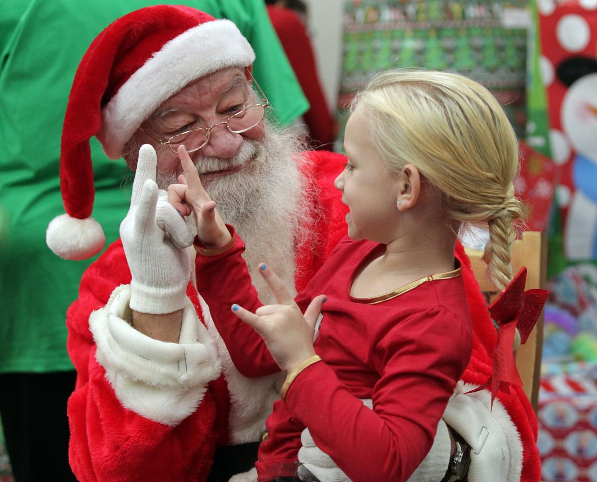 Children experience Christmas magic through Deaf Santa event | News ...