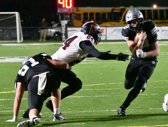 Prep football: Nitro breaks loose in second half to knock out North ...