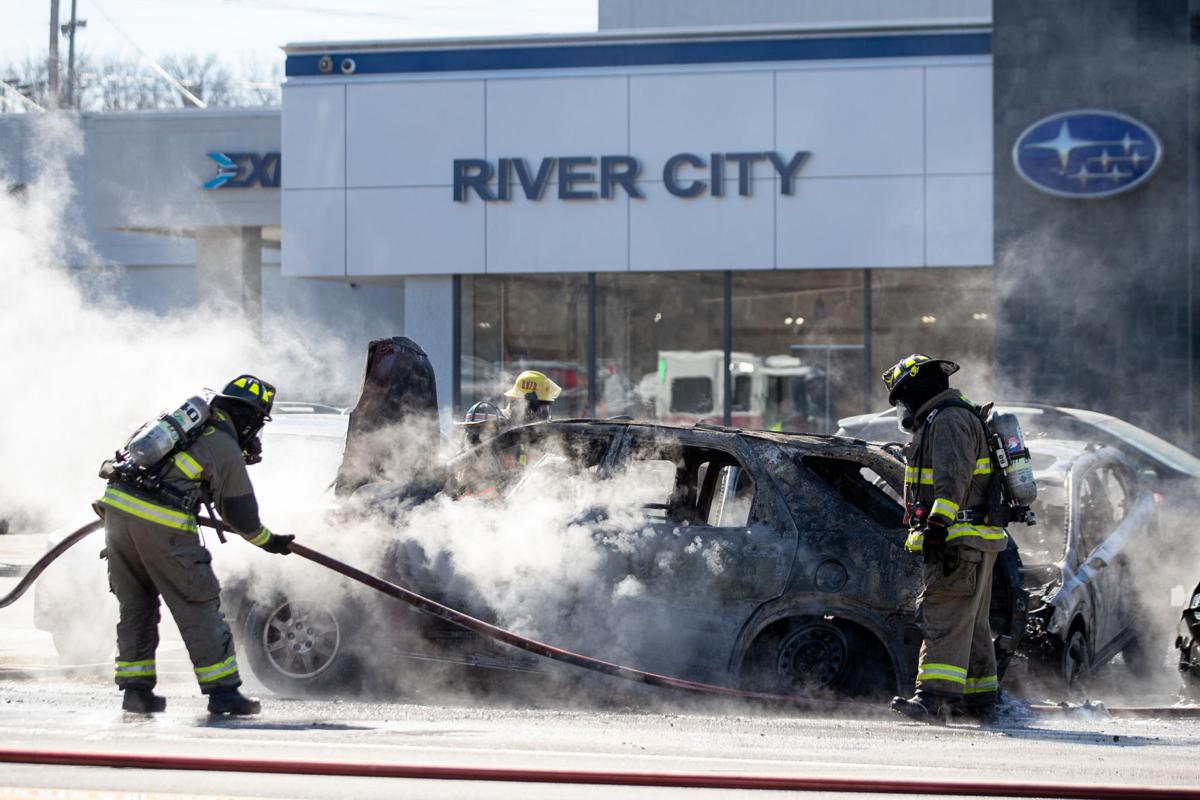 Photos: Firefighters battle vehicle fire at River City Subaru ...