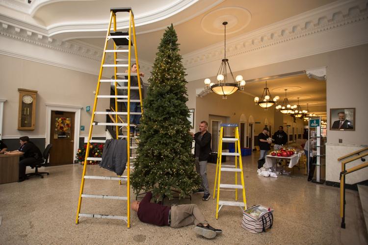 Workers put up Christmas tree at City Hall | News | herald-dispatch.com