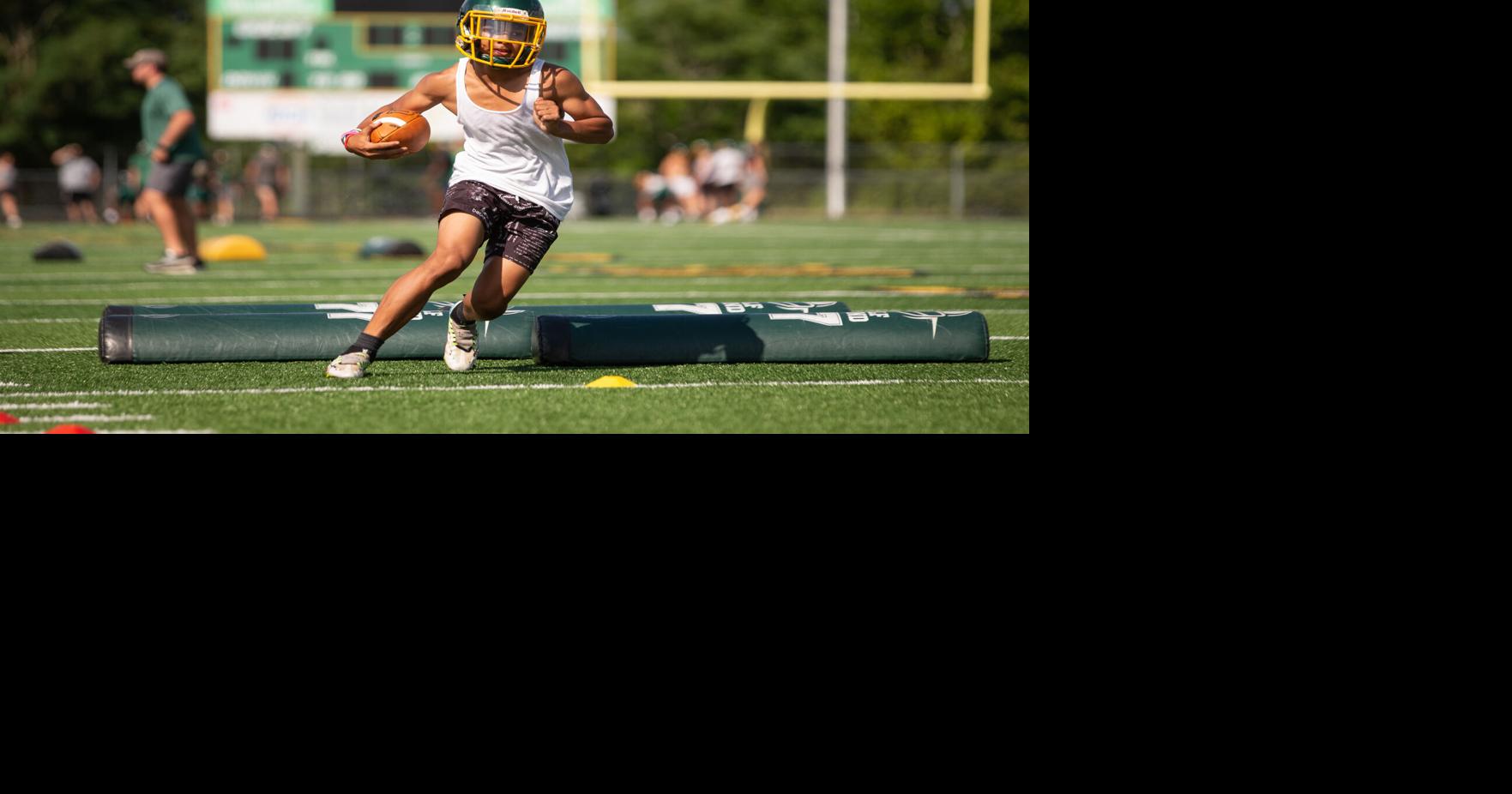 Photos: HHS football team conducts first day of summer practice ...