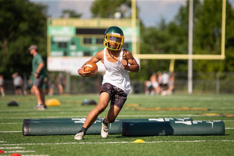 Photos: HHS football team conducts first day of summer practice ...
