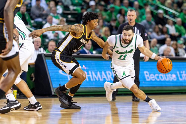 Herd men clip Golden Eagles, 83-67 | Sports | herald-dispatch.com