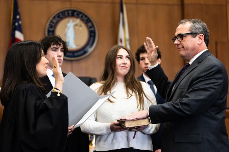 Photos: Chief Justice Bunn swears in Judge David D. Amsbary ...