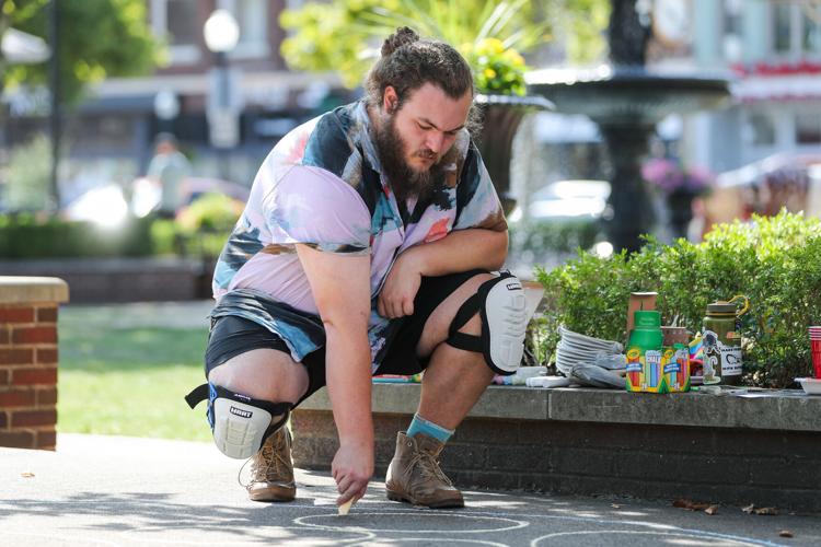 Chalk artwork brings color downtown | News | herald-dispatch.com