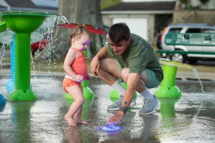 Families take advantage of waning warm days at splash pads | News ...