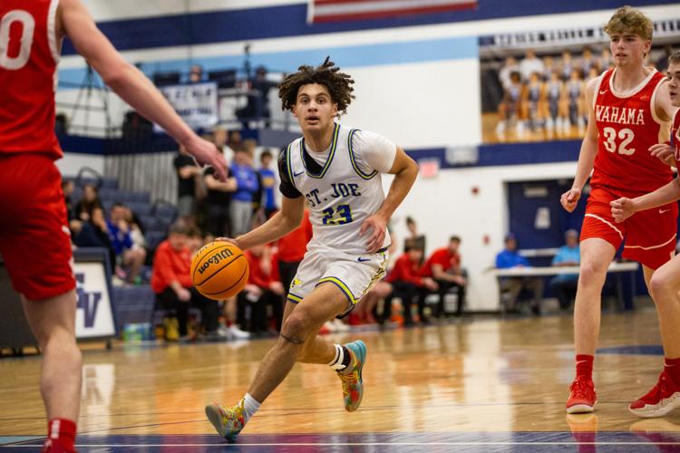 Prep boys basketball: Irish stave off Wahama to head back to state ...
