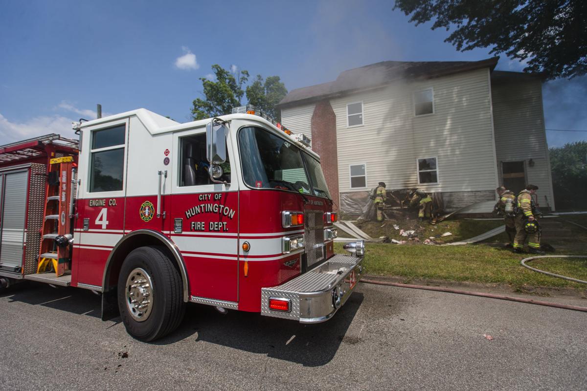 Two house fires burn simultaneously in Huntington | News | herald ...