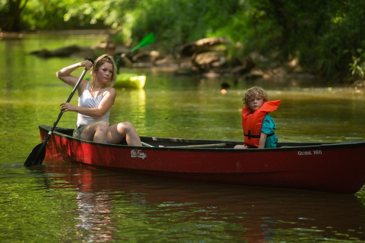 People paddle area lakes, rivers in celebration of National Canoe Day ...