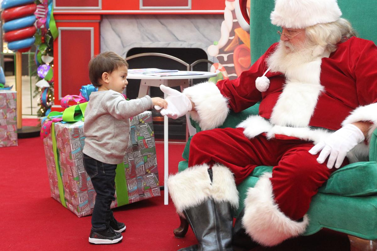 Photos: Santa Claus visits the Huntington Mall | Multimedia | herald ...