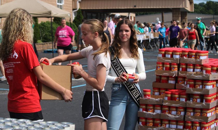 Volunteers pack summer food boxes for students | Putnam News | herald ...