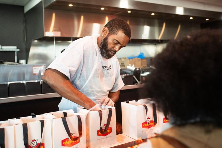 Photos: Randy Moss opens Crisppi's Chicken in downtown Huntington ...