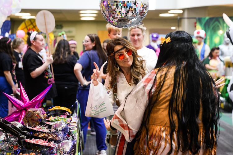 Photos: Hoops Family Children's Hospital conducts Trick-or-Treat for ...
