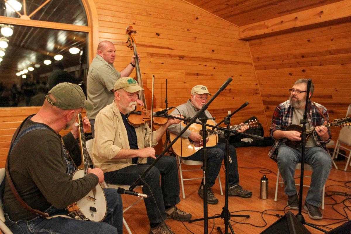 Old time square dance and music taking place at Heritage Farm ...